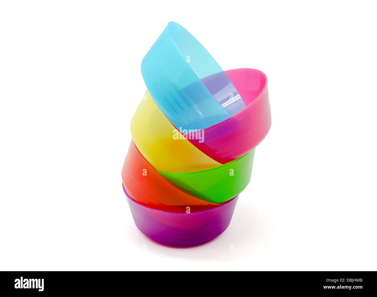 Plastic tableware of various colors on white background Stock Photo - Alamy