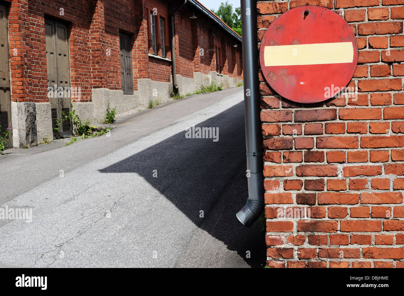 no entry road sign on a brick wall Stock Photo - Alamy