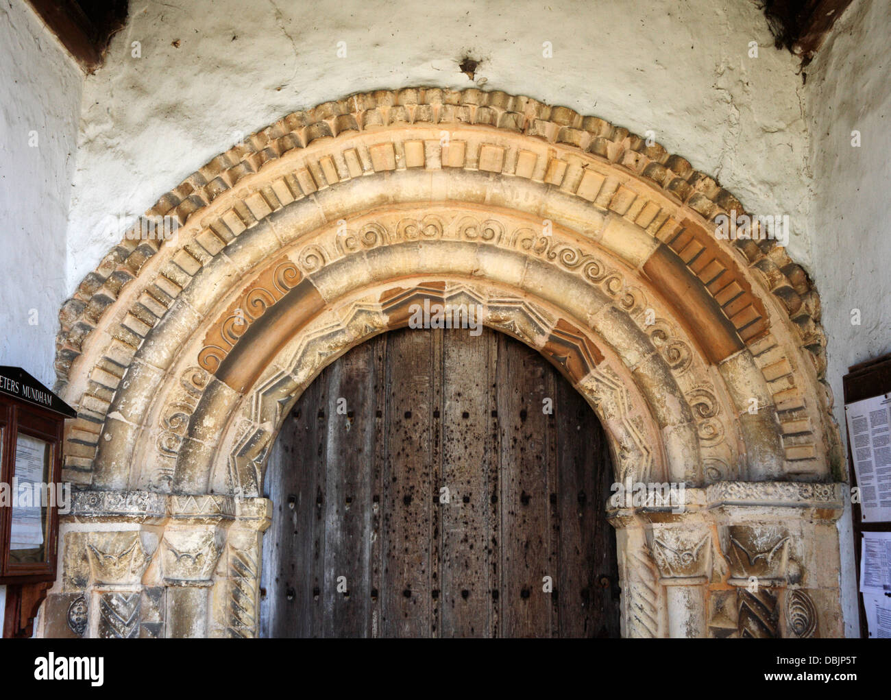 A view of the arch of the Norman doorway at the parish church of St ...