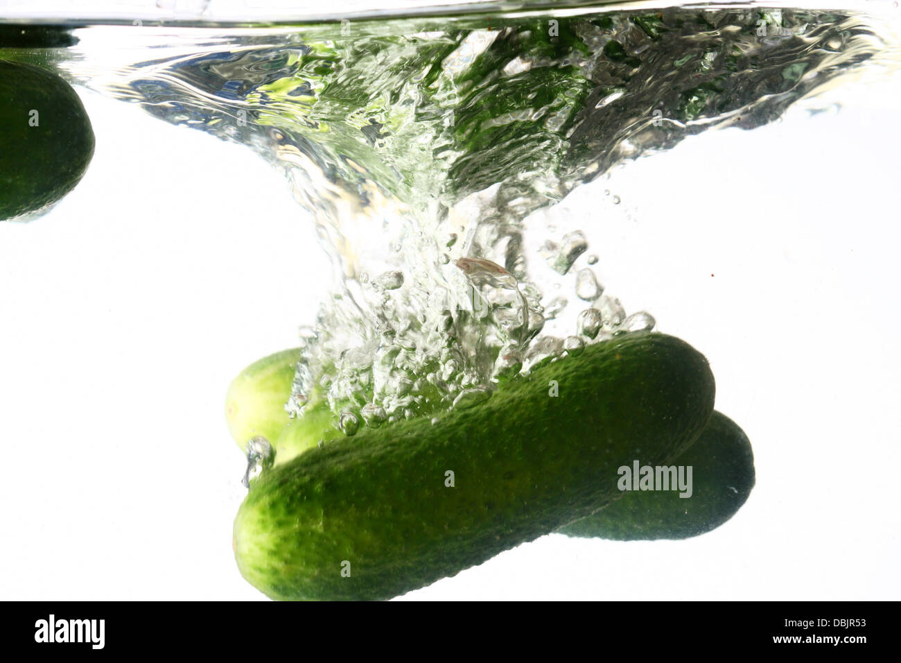 cucumber splash isolated on white background Stock Photo - Alamy