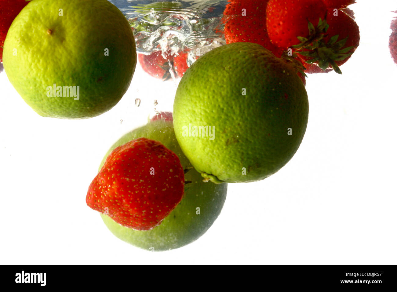 lime splash isolated on white background Stock Photo - Alamy