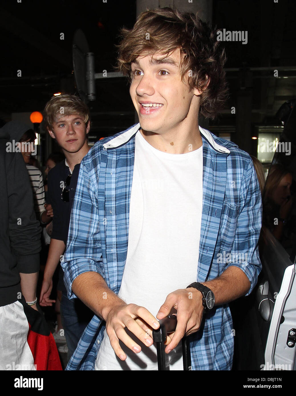 Liam Payne of One Direction arriving at Heathrow airport on a flight ...