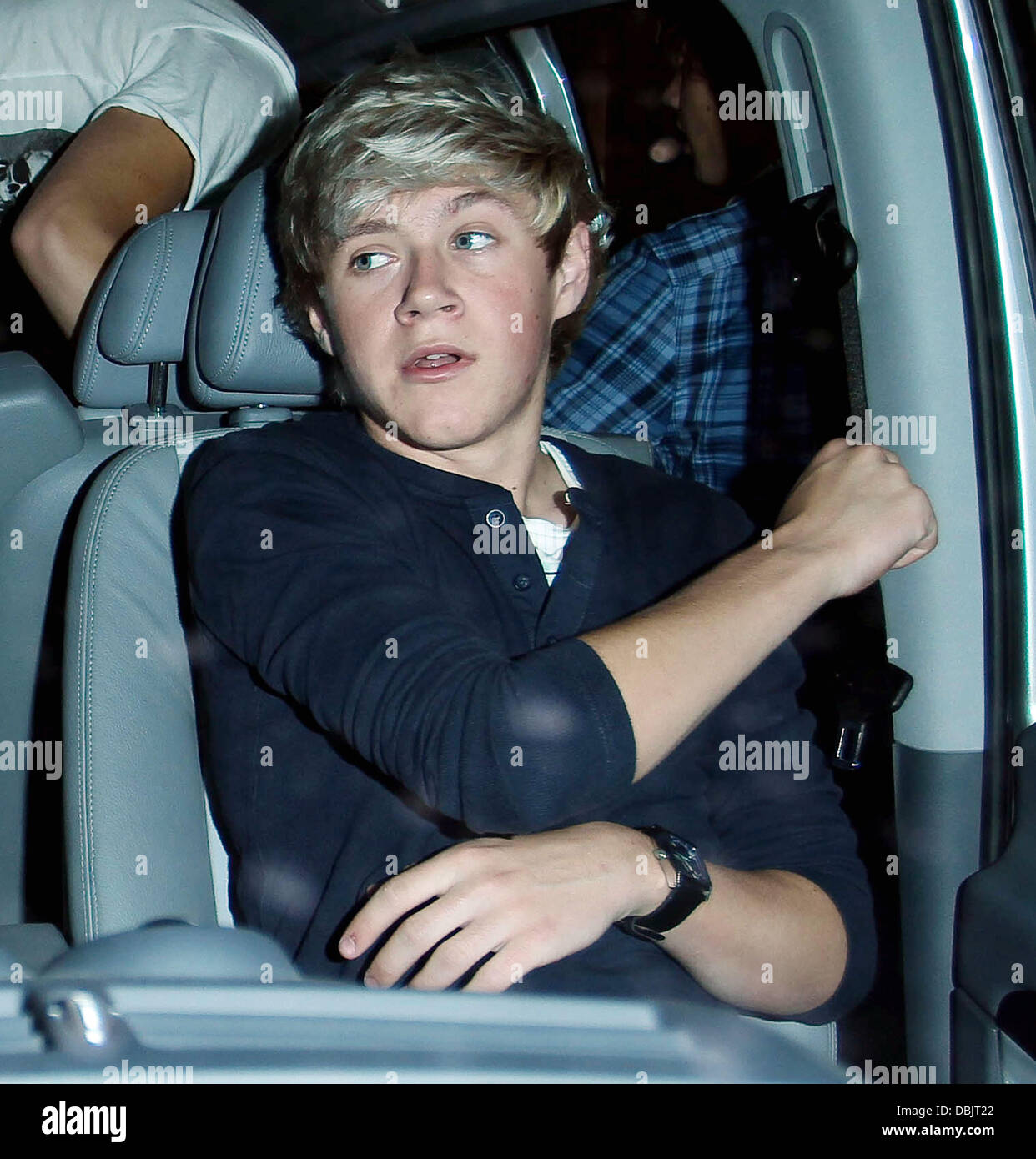Niall Horan of One Direction arriving at Heathrow airport on a flight ...