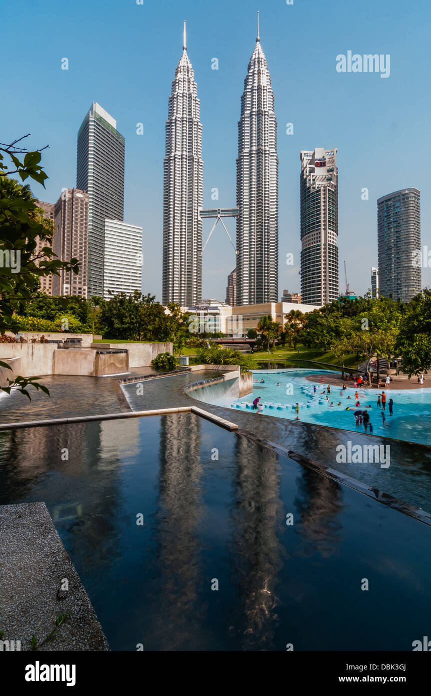 Morning at KLCC with reflection KLCC at lake Stock Photo - Alamy