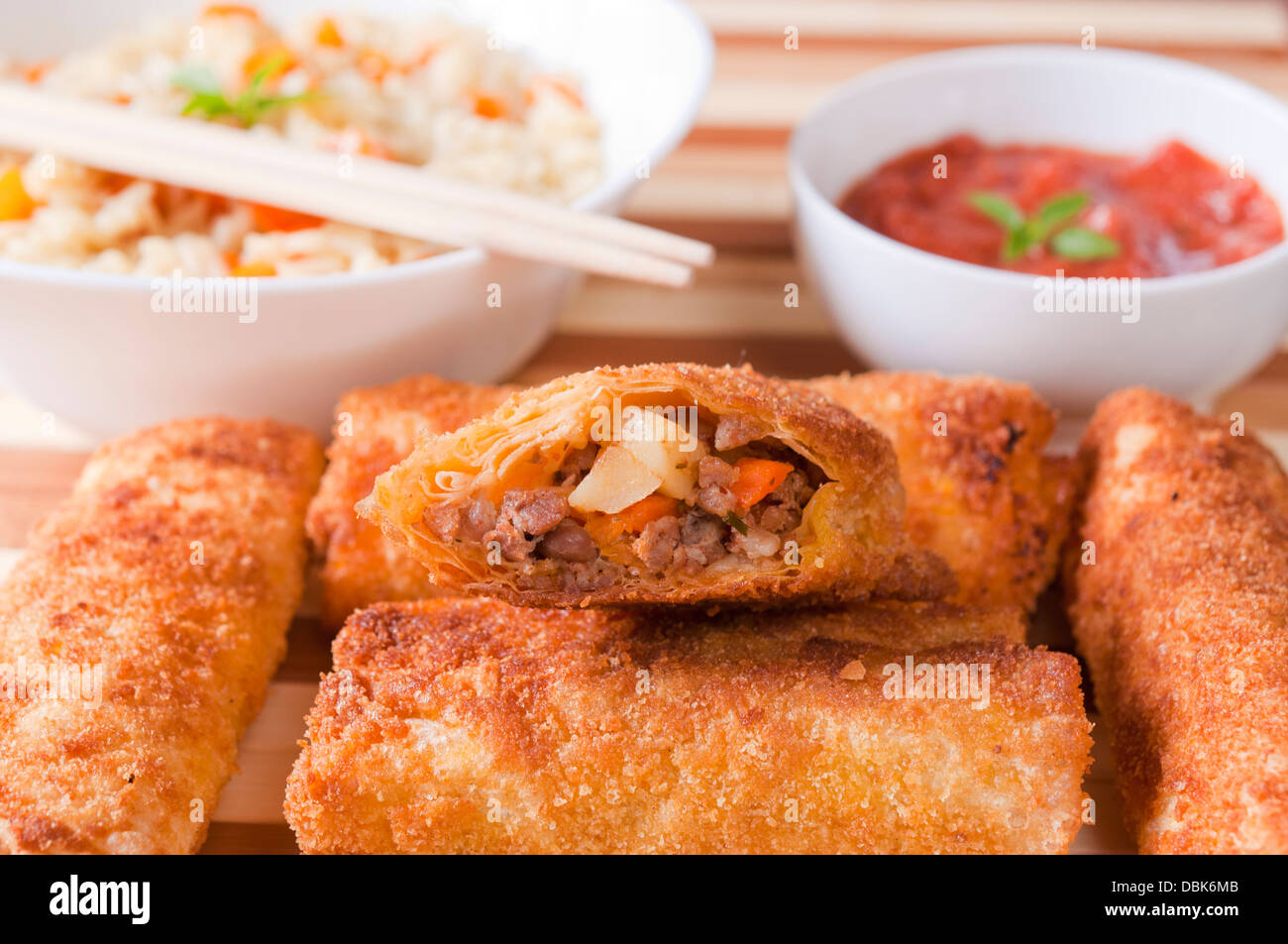 Selective focus in the middle of sliced rolls Stock Photo - Alamy