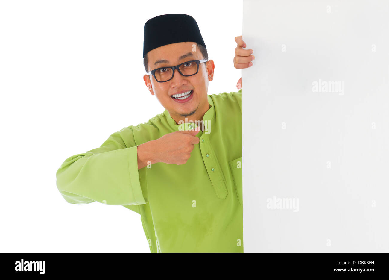malay male with blank card during hari raya Eid al-Fitr aidilfitri ...