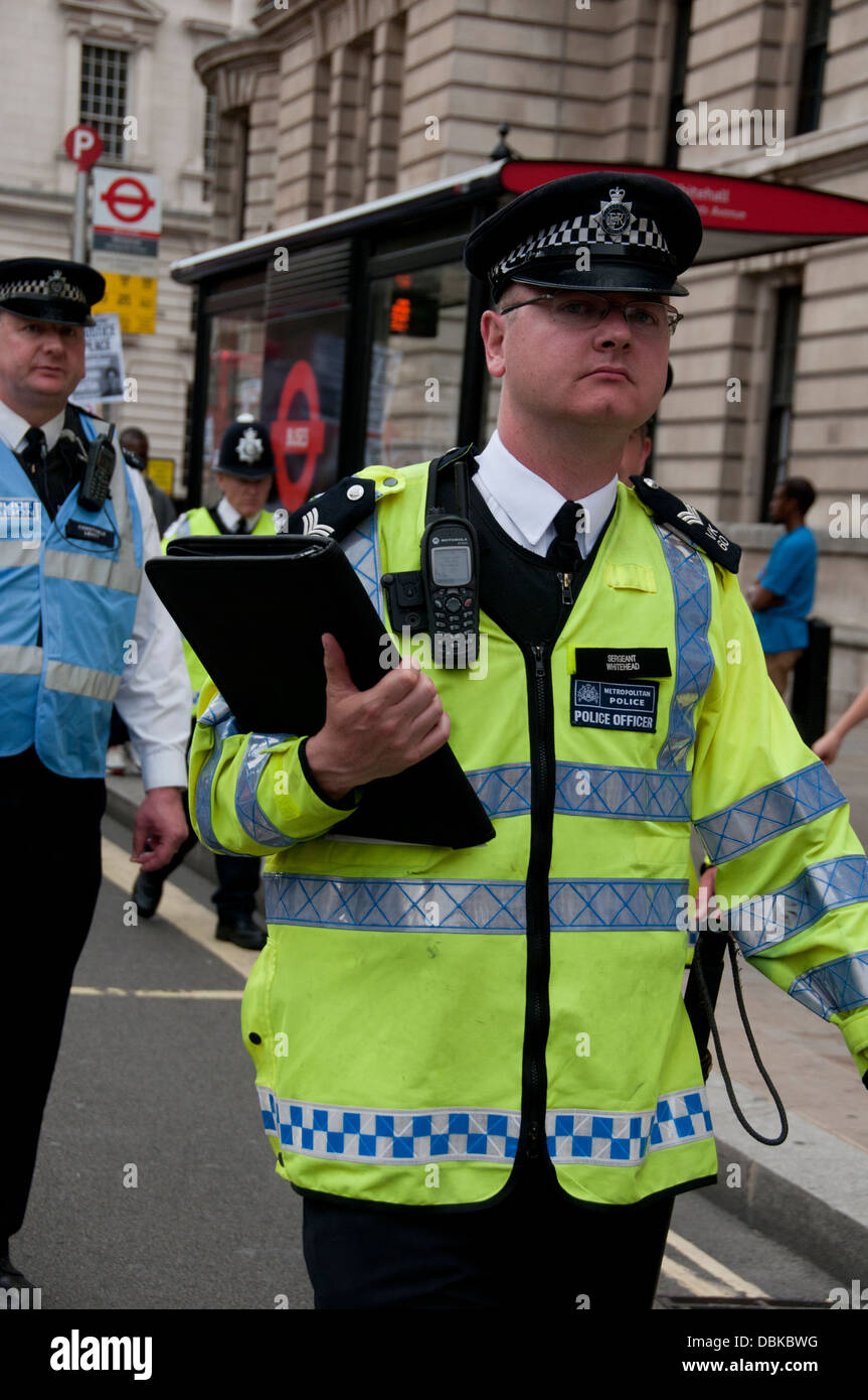 London Metropolitan Police sergeant on duty at a protest Stock Photo ...
