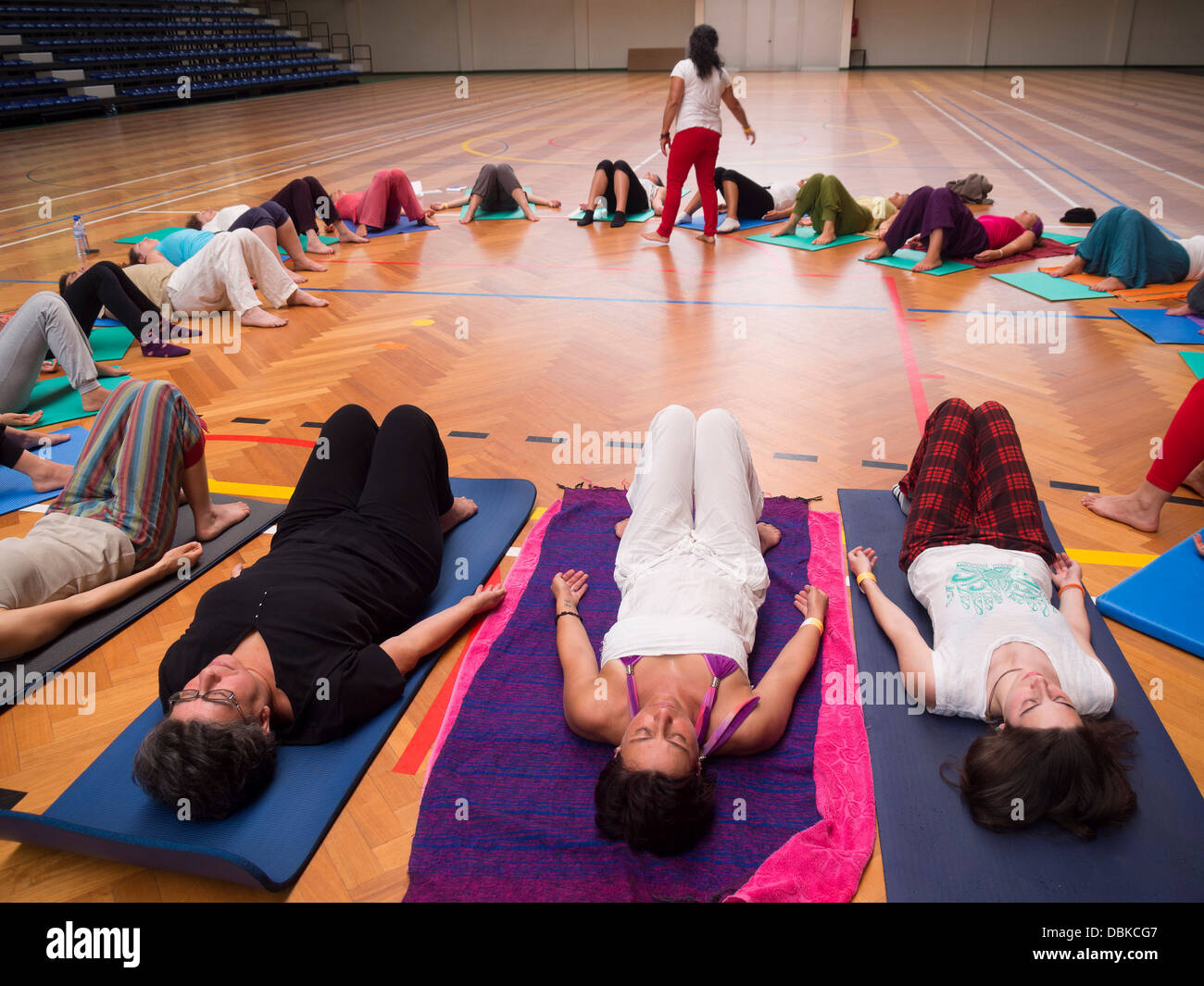 People relaxing during Pilates class Stock Photo - Alamy