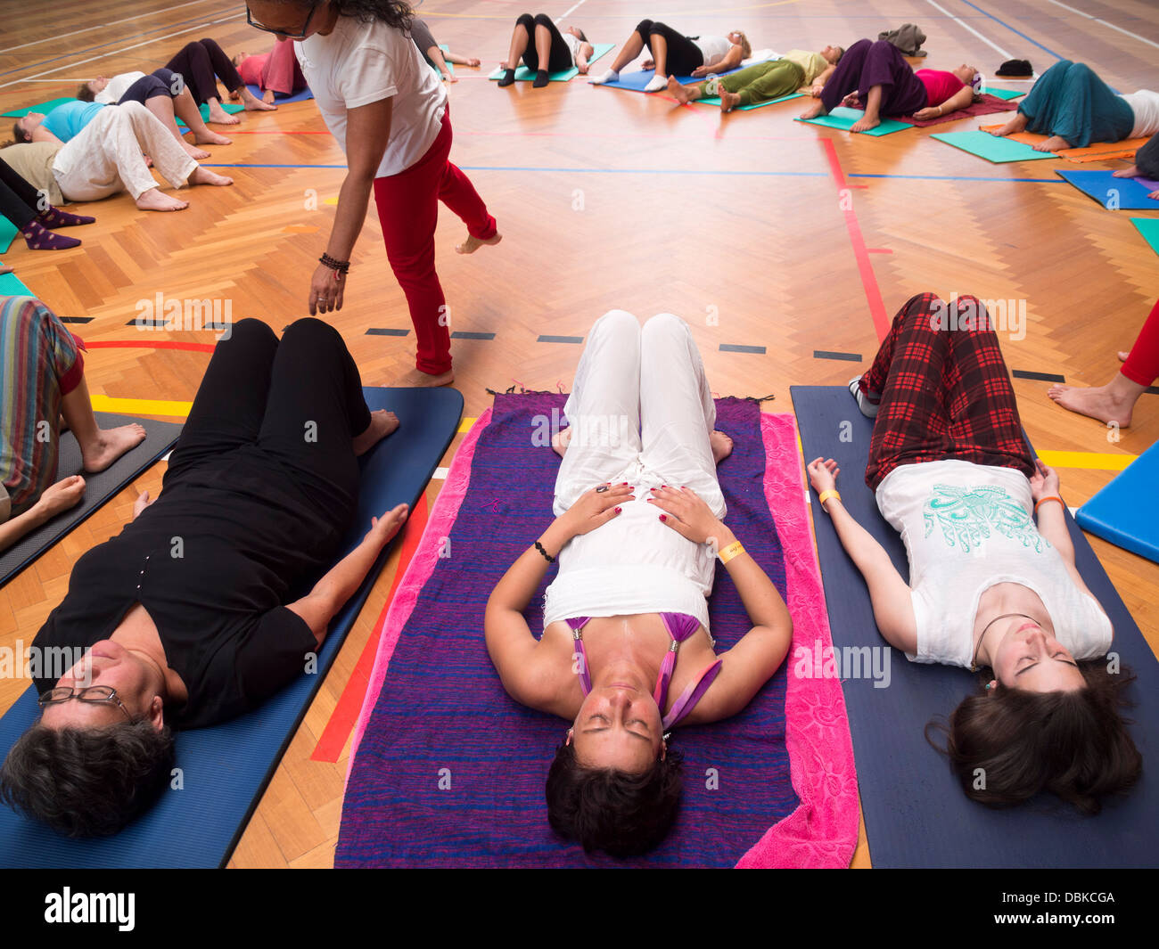 People relaxing during Pilates class Stock Photo - Alamy