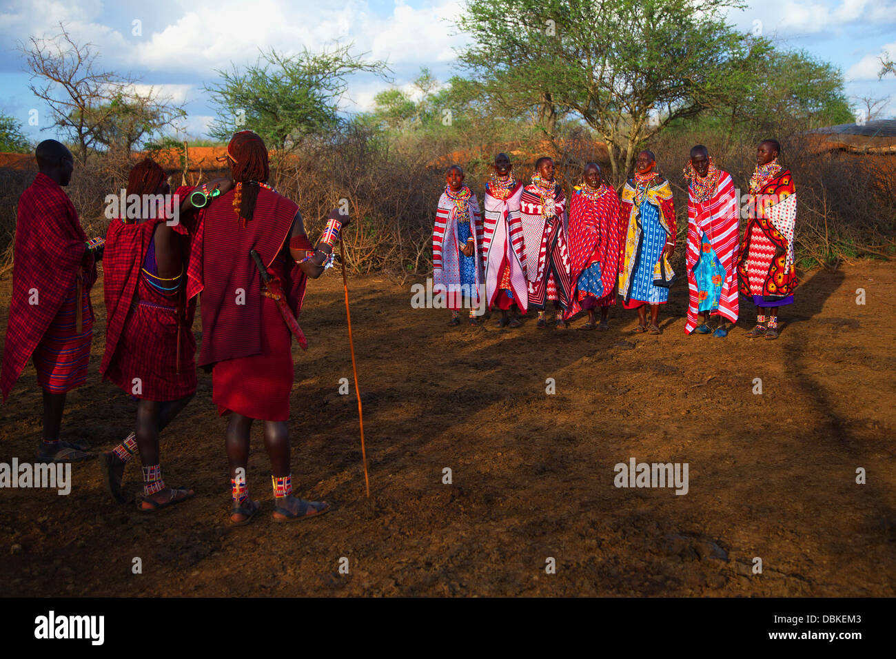 Masai Villagers in traditional clothing outside boma. Selenkay ...
