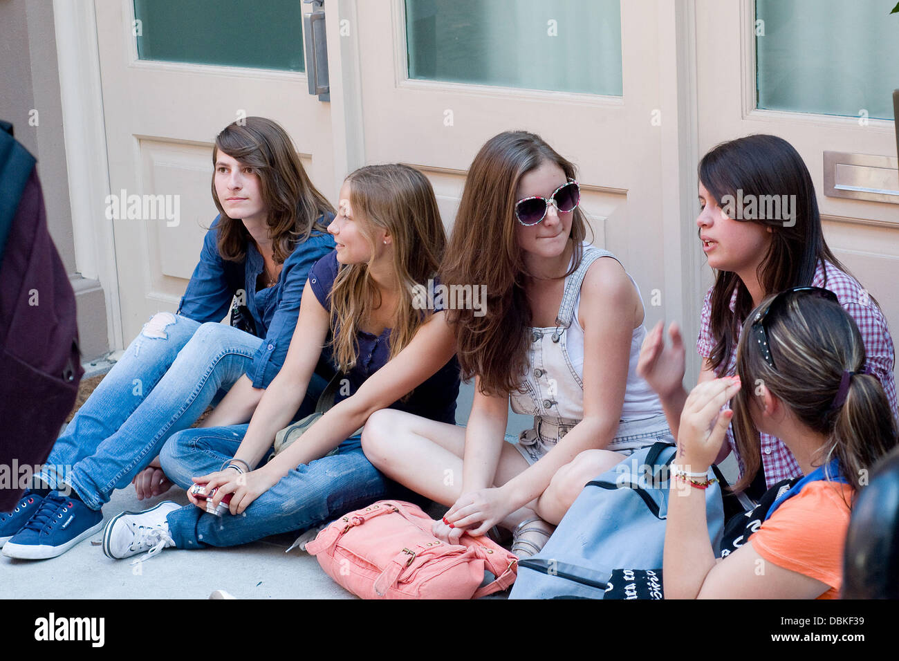A group of French tourists gathered in front of former IMF Chief ...