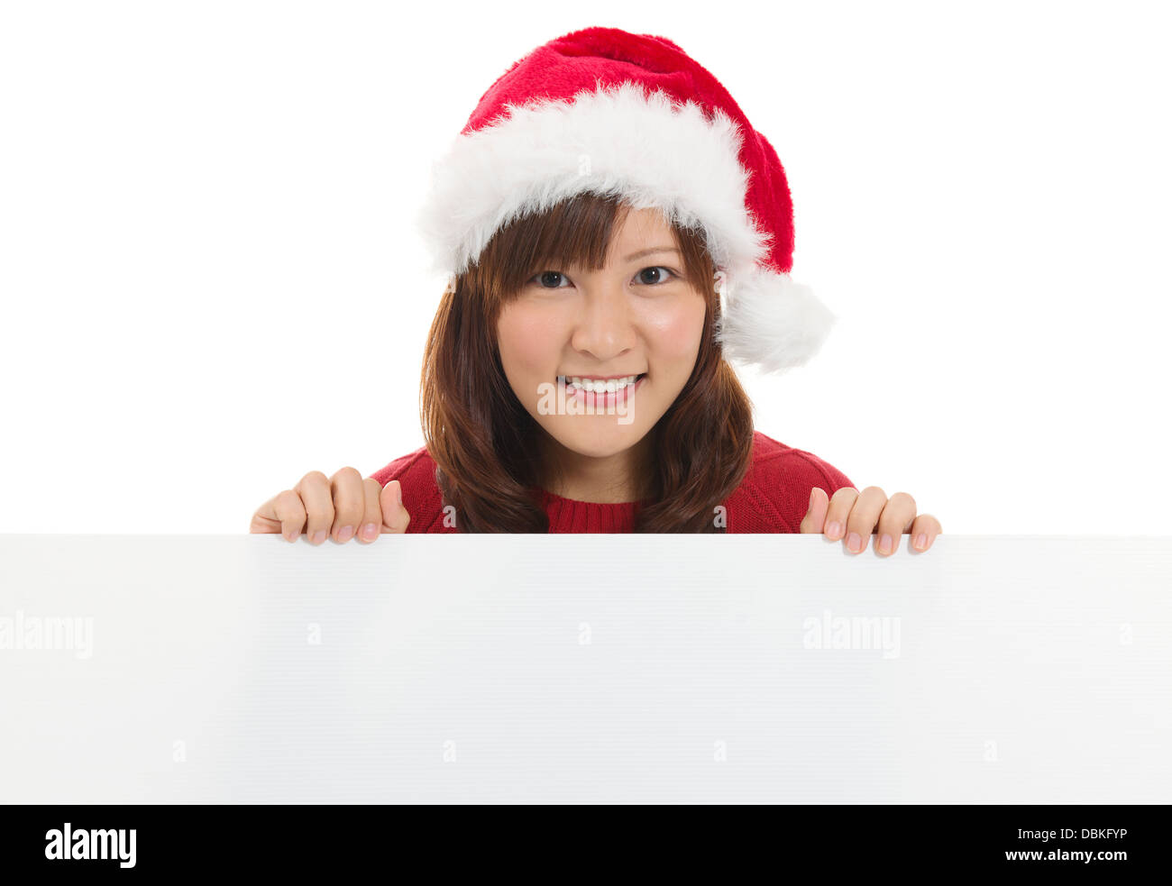 Cute Asian Christmas santa woman smiling and showing blank empty ...