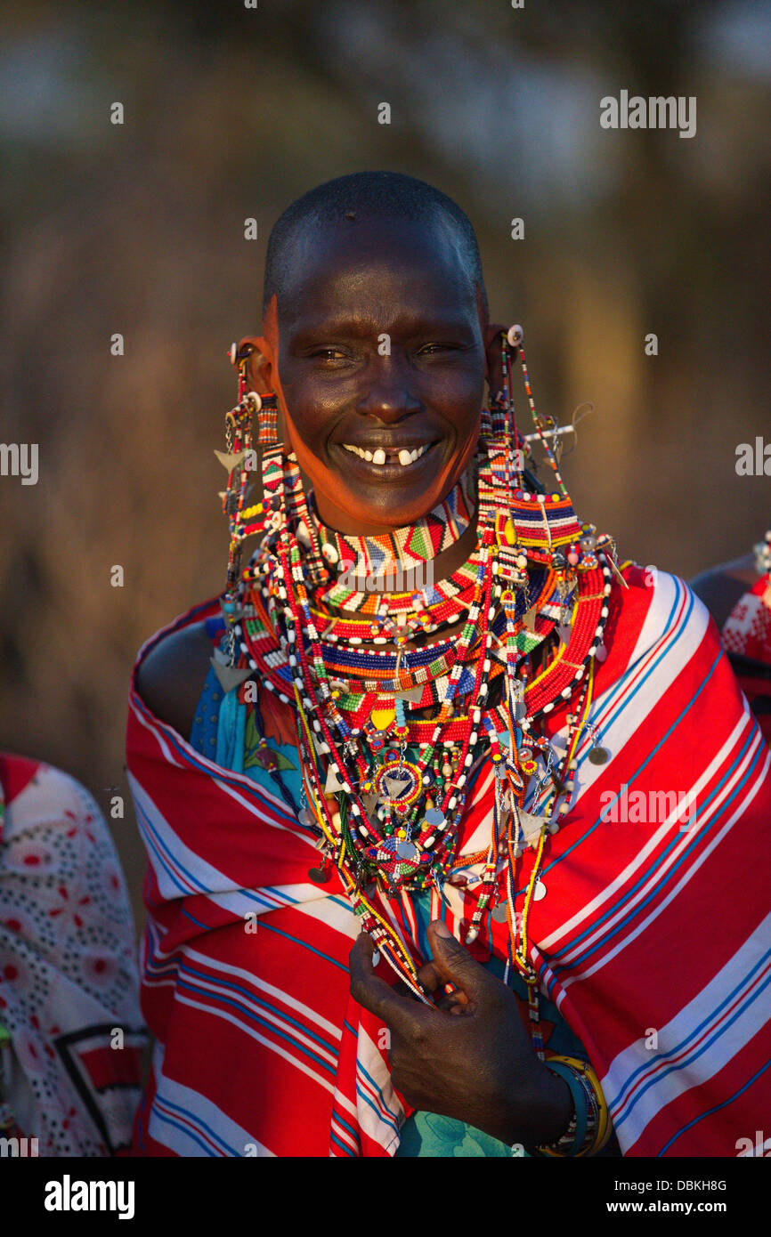Portrait of Masai Woman in traditional clothing and jewelry. Ol Kinyei ...