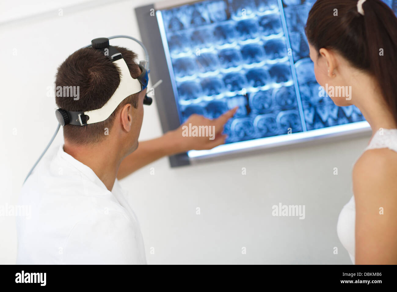 Doctor and Patient Examining MRI Scans Stock Photo - Alamy