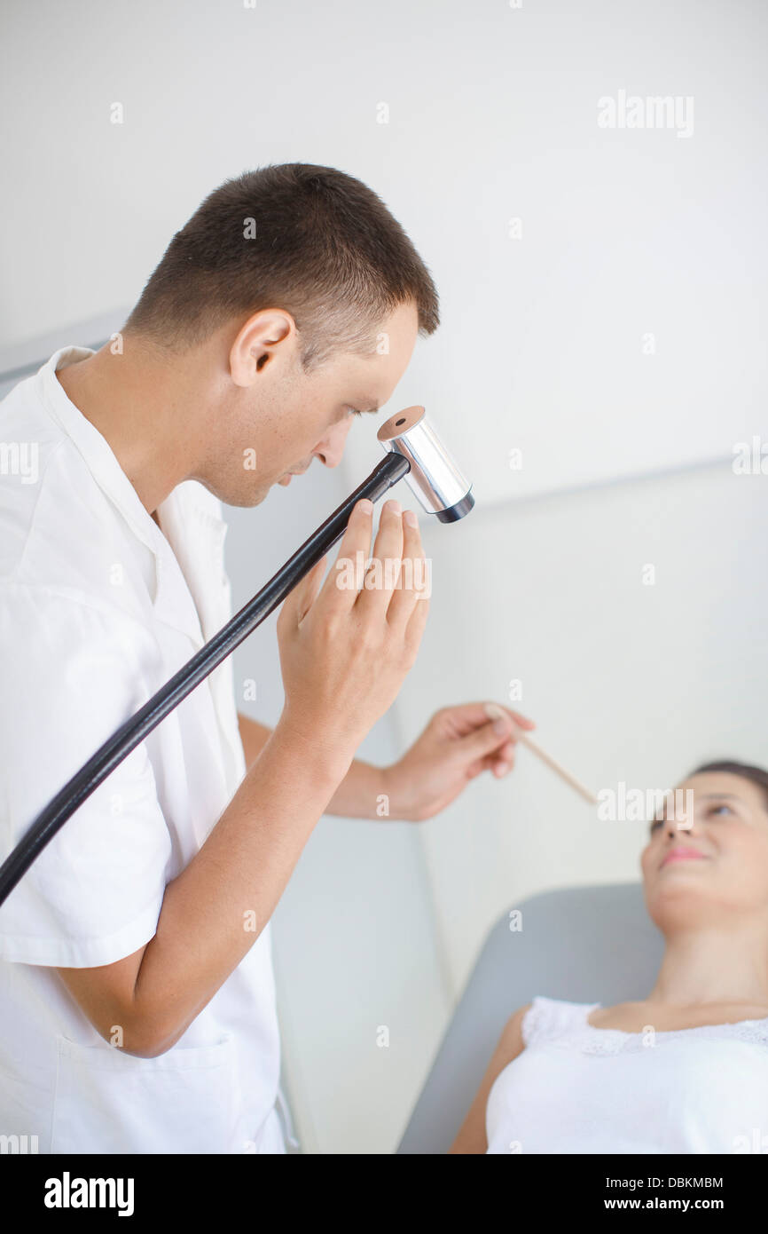Ent physician examines hi-res stock photography and images - Alamy