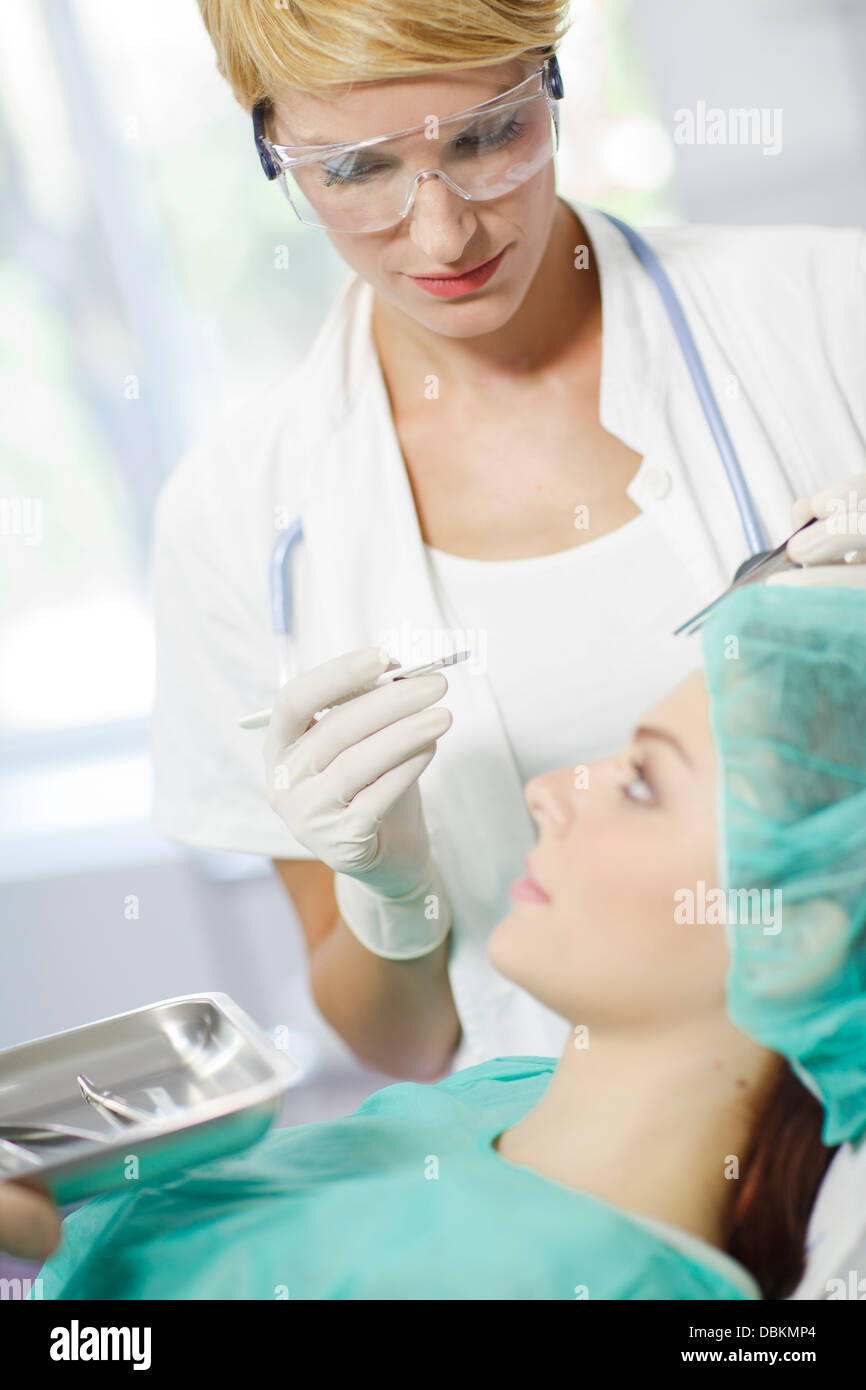 Patient Getting A Cosmetic Surgery Treatment Stock Photo - Alamy
