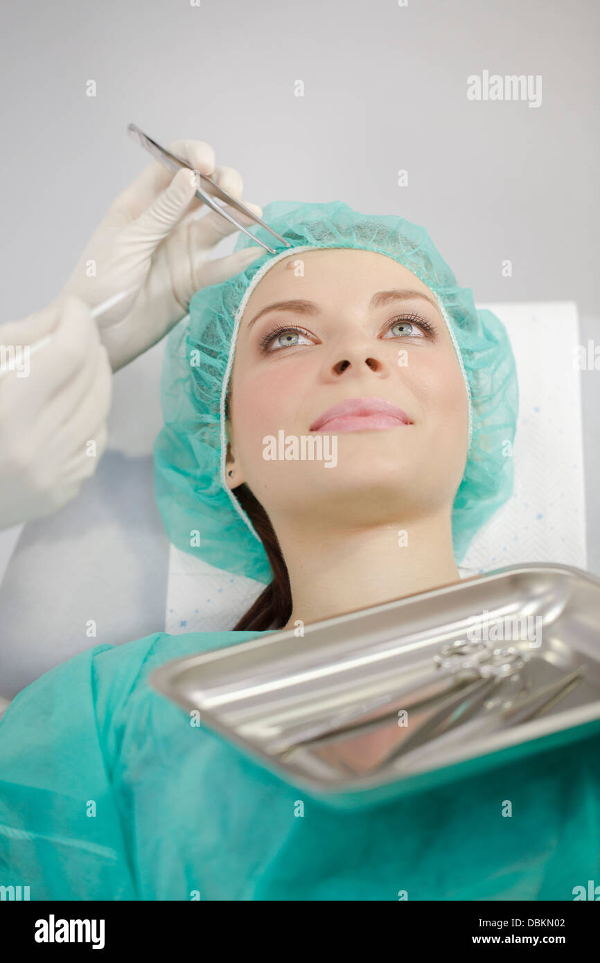 Patient In Treatment Stock Photo - Alamy