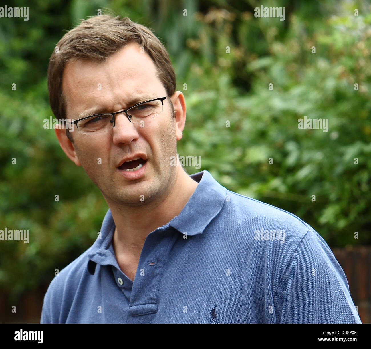 Former News of the World editor Andy Coulson leaves his home to go out ...
