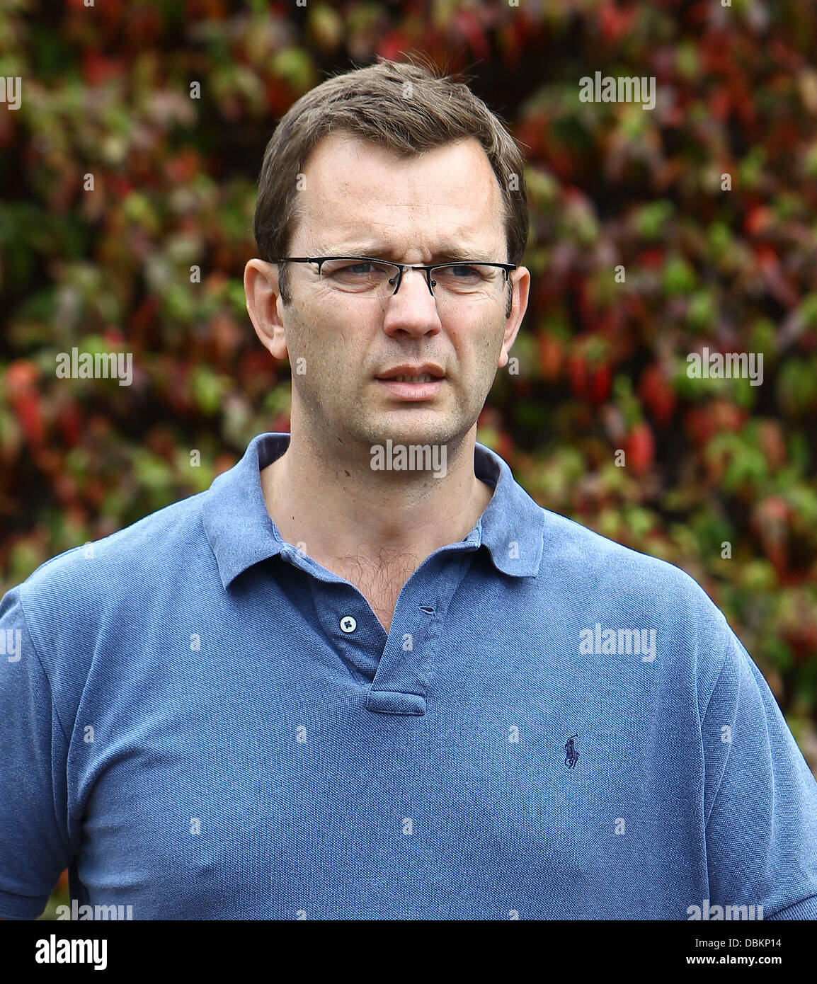 Former News of the World editor Andy Coulson leaves his home to go out ...