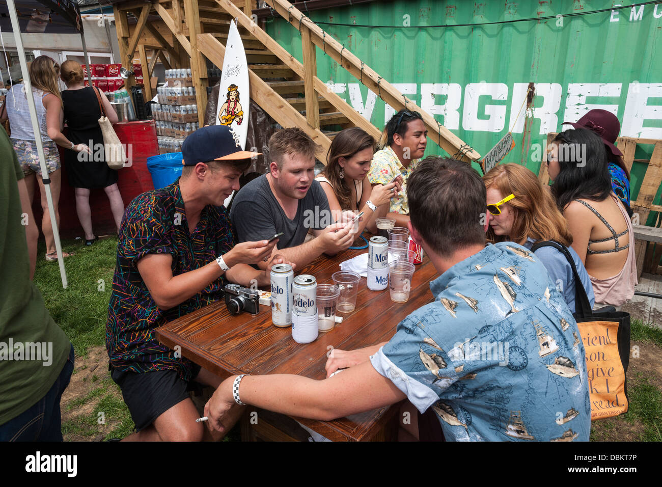 Hipsters drink beer and and buy food from food trucks at the annual ...
