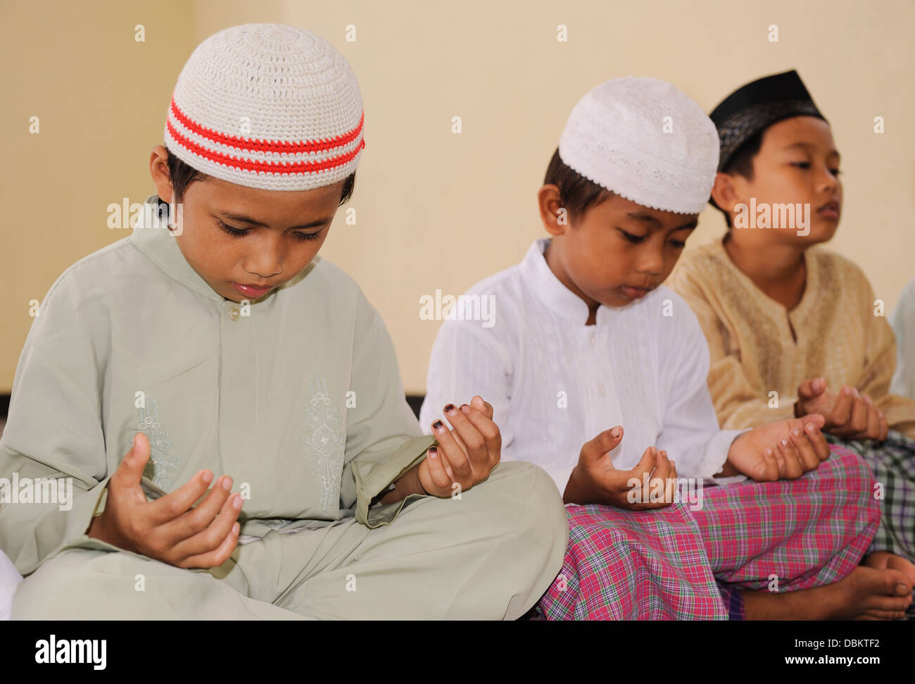 Muslim Kids Praying Stock Photo - Alamy