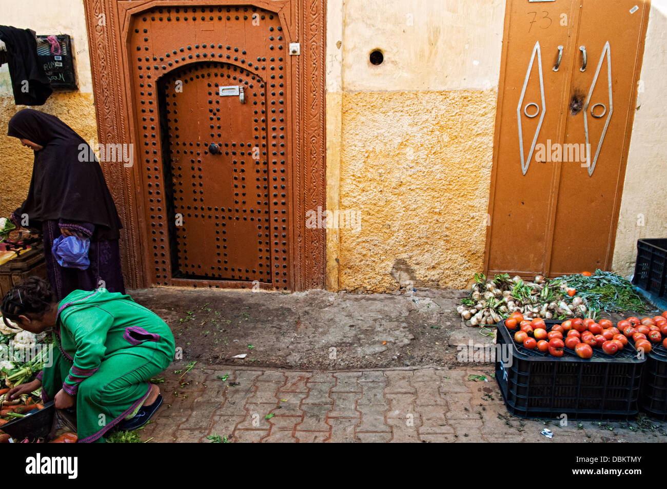 Women buying vegetables medina meknes hi-res stock photography and ...