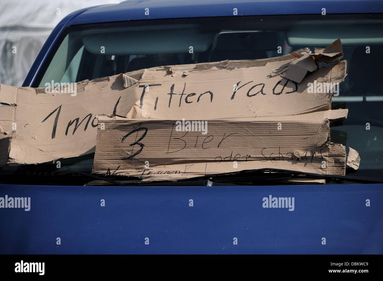 Wacken, Germany. 01st Aug, 2013. A cardboard message asking women to ...