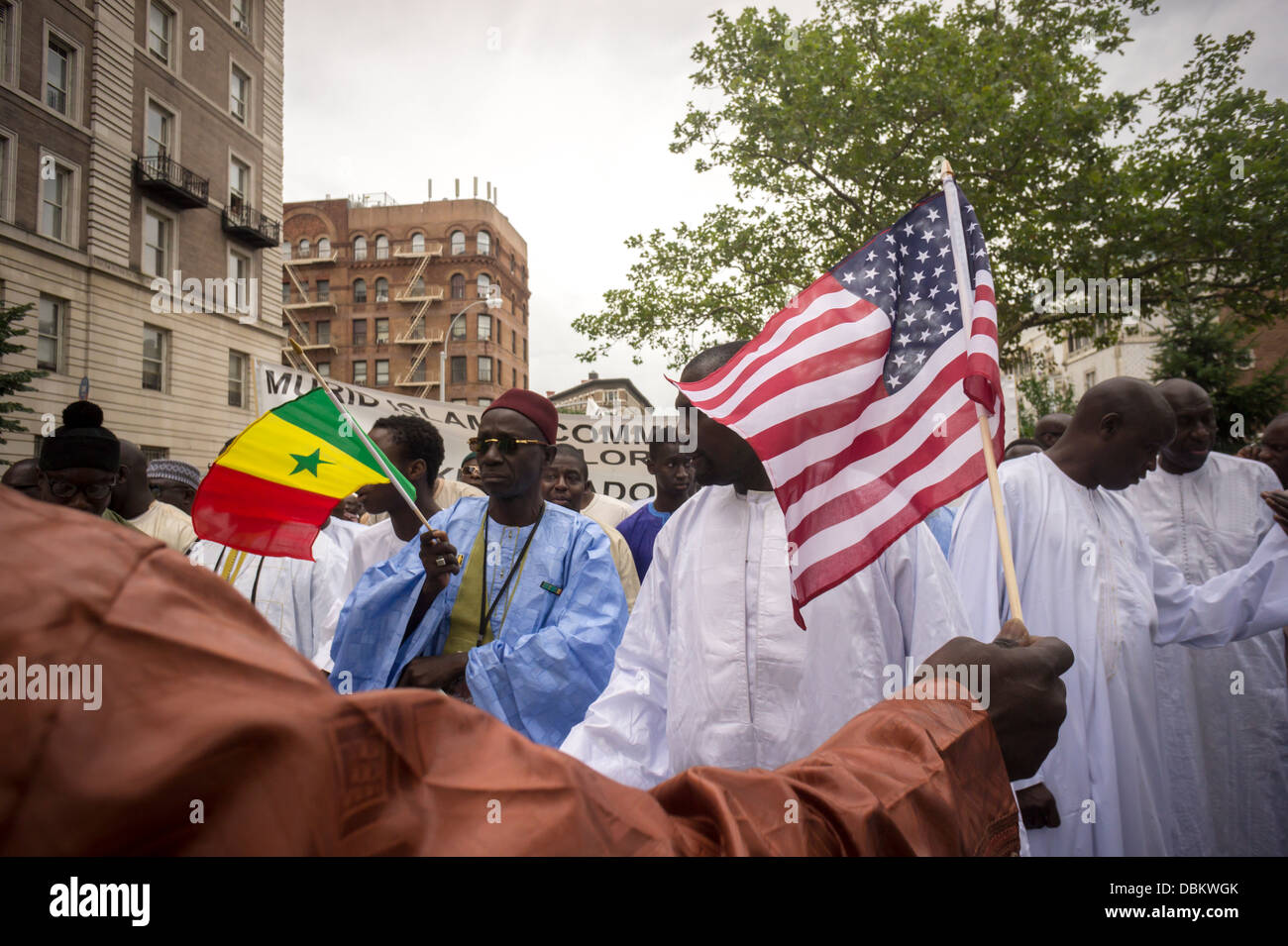 Senegalese immigrants participate in a parade in Harlem in New York ...