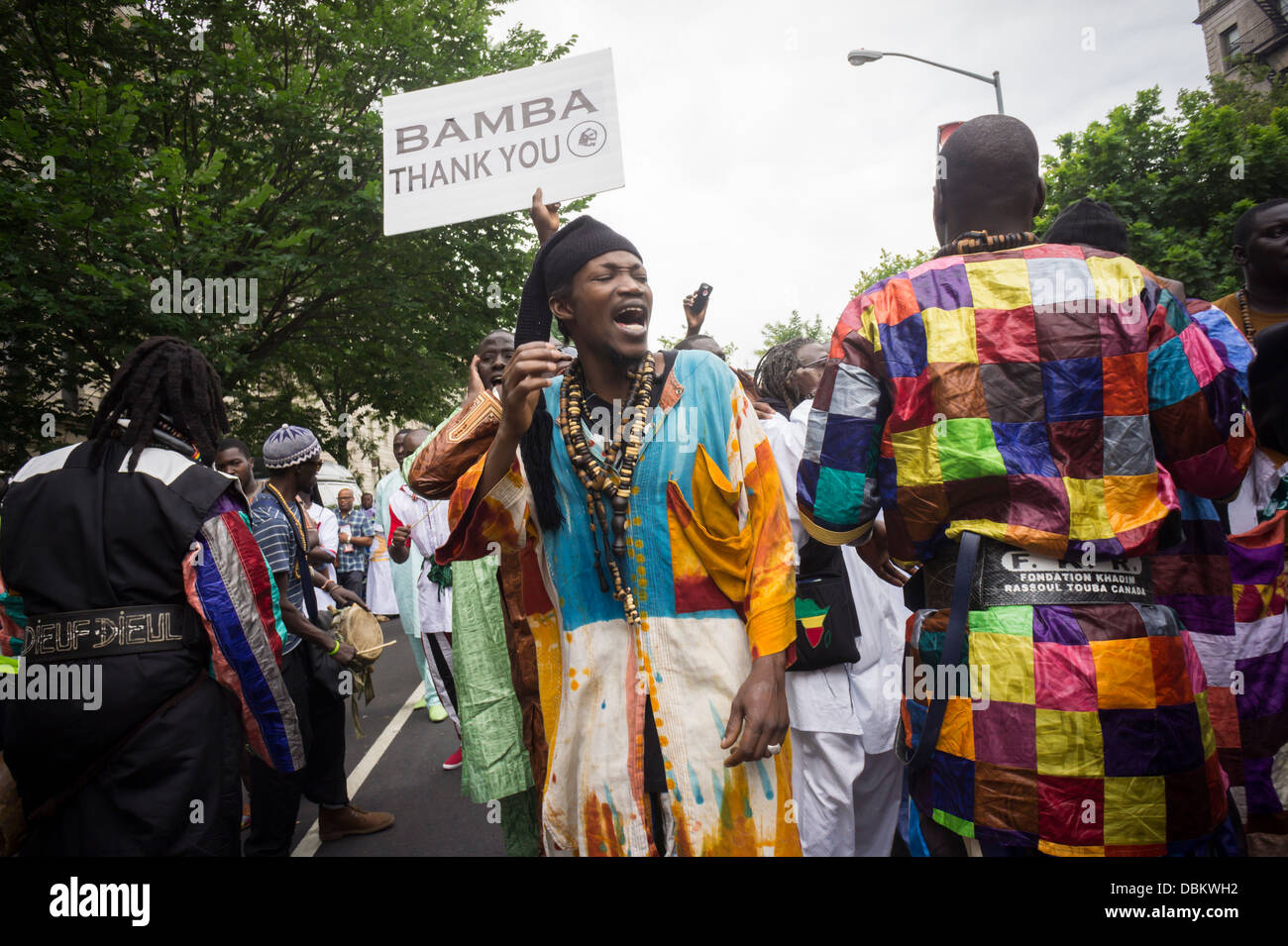 Sengalese immigrants participate in a parade in Harlem in New York ...