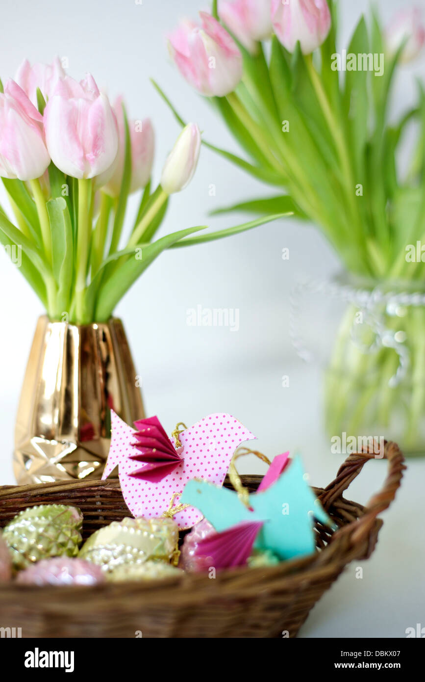 Easter flowers in basket hi-res stock photography and images - Alamy