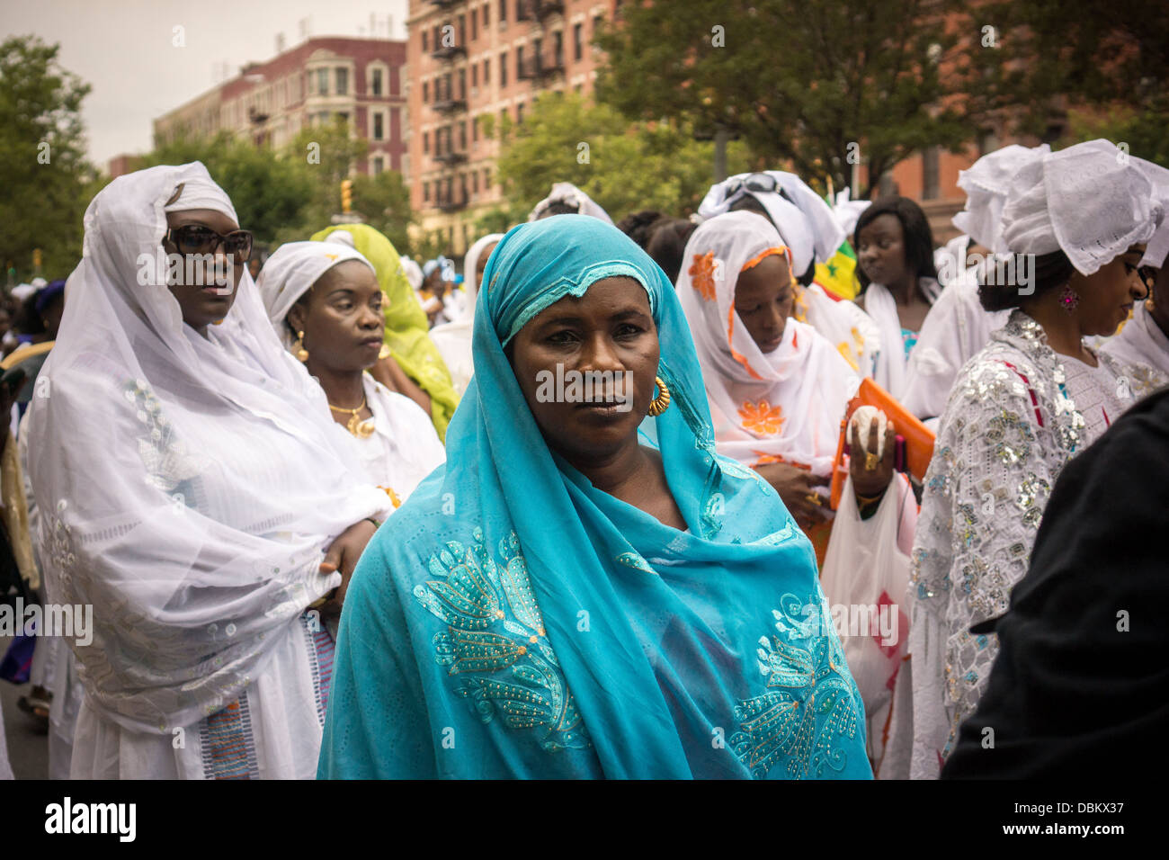 Sengalese immigrants participate in a parade in Harlem in New York ...
