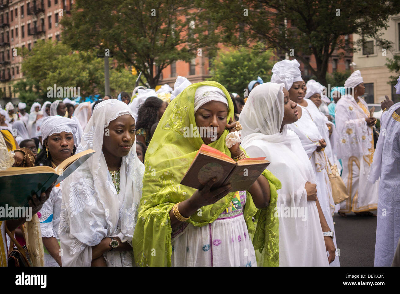 Senegalese immigrants participate in a parade in Harlem in New York ...