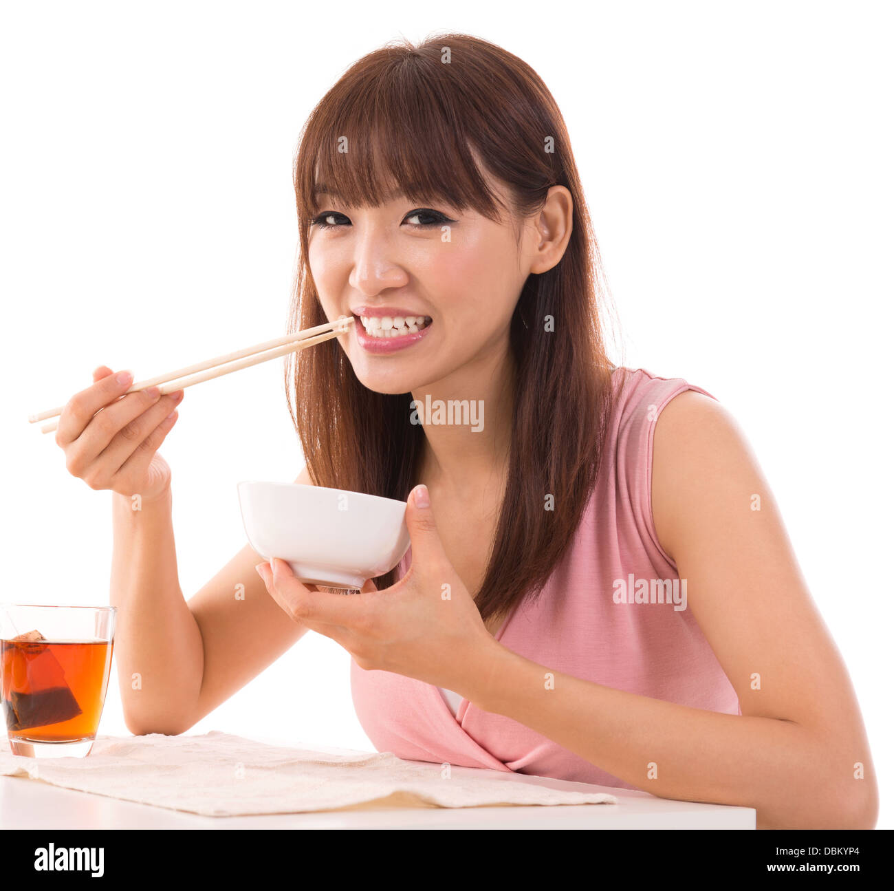 Portrait of Asian woman eat rice isolated on white background. Asian ...