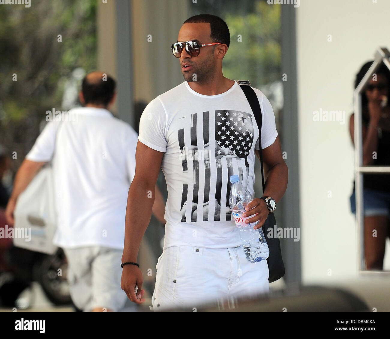Singer Craig David leaving the W Hotel South Beach in a red Ferrari ...