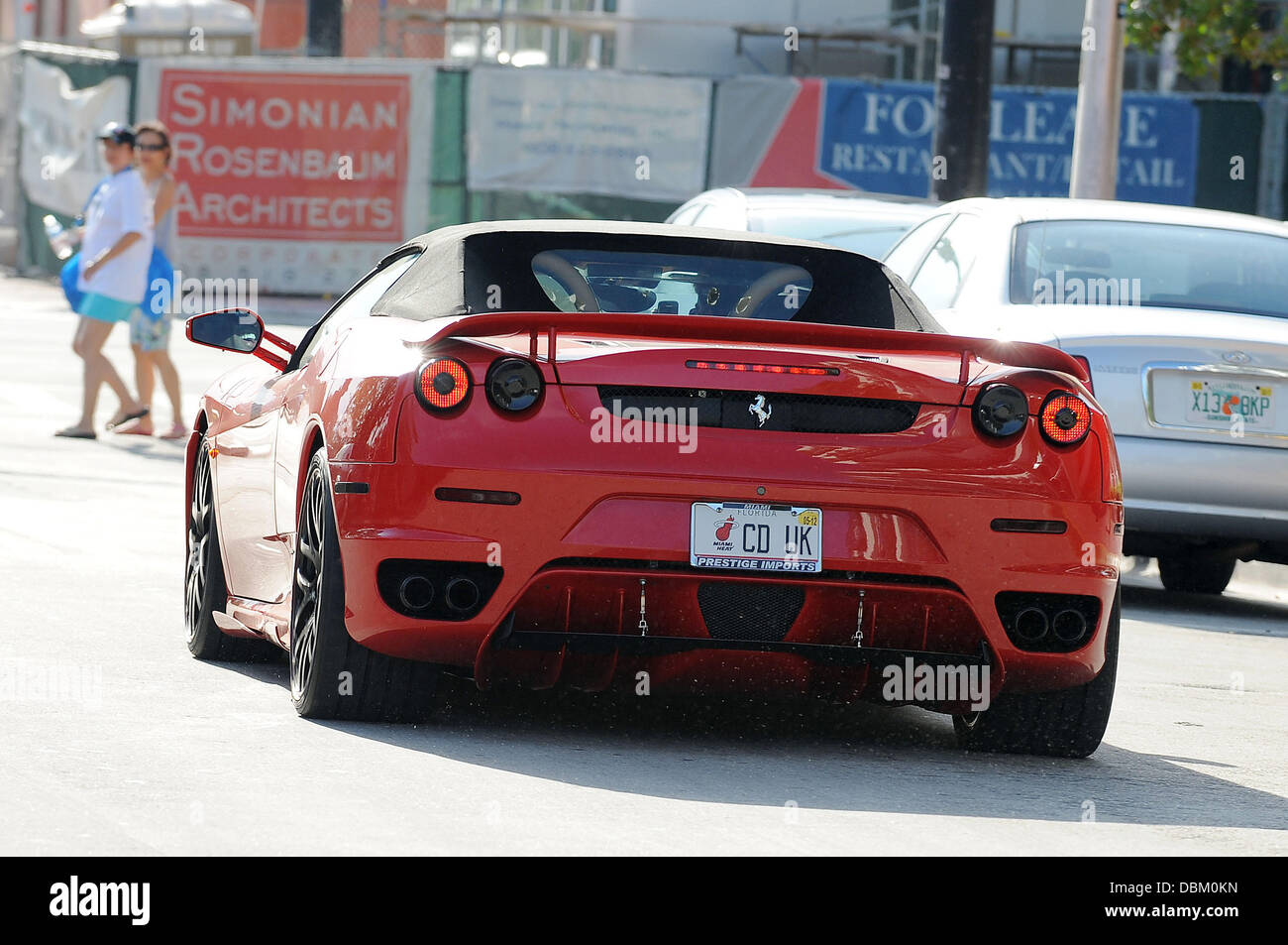 Singer Craig David leaving the W Hotel South Beach in a red Ferrari ...