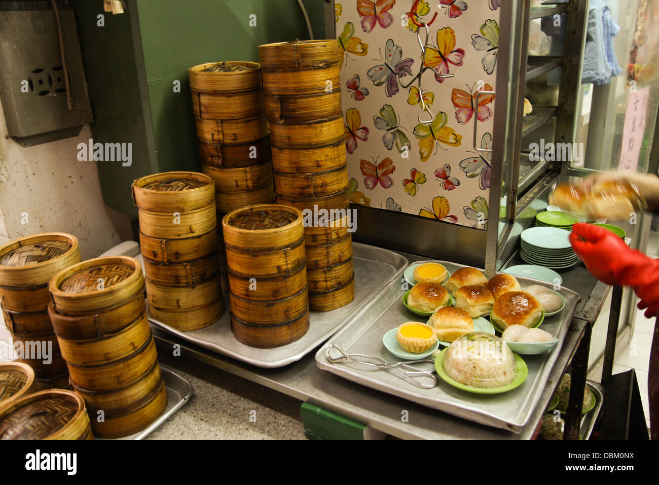 large and small bamboo dim sum containers Stock Photo - Alamy