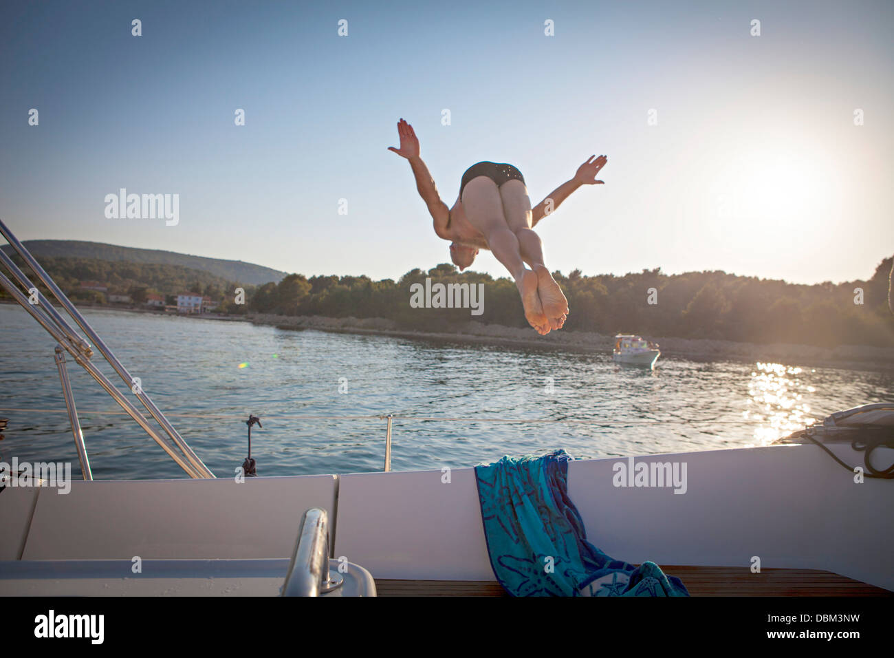 Young men dive in swimming hi-res stock photography and images - Alamy