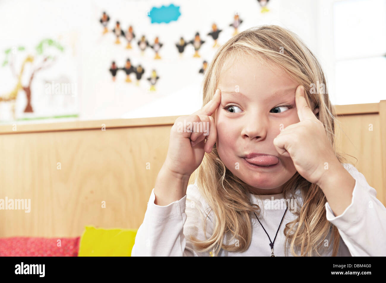Little Blonde Girl Making Funny Face, Kottgeisering, Bavaria, Germany ...
