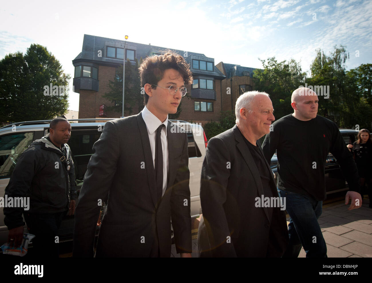 Charlie Gilmour arrives with his father David Gilmour at Kingston Crown ...