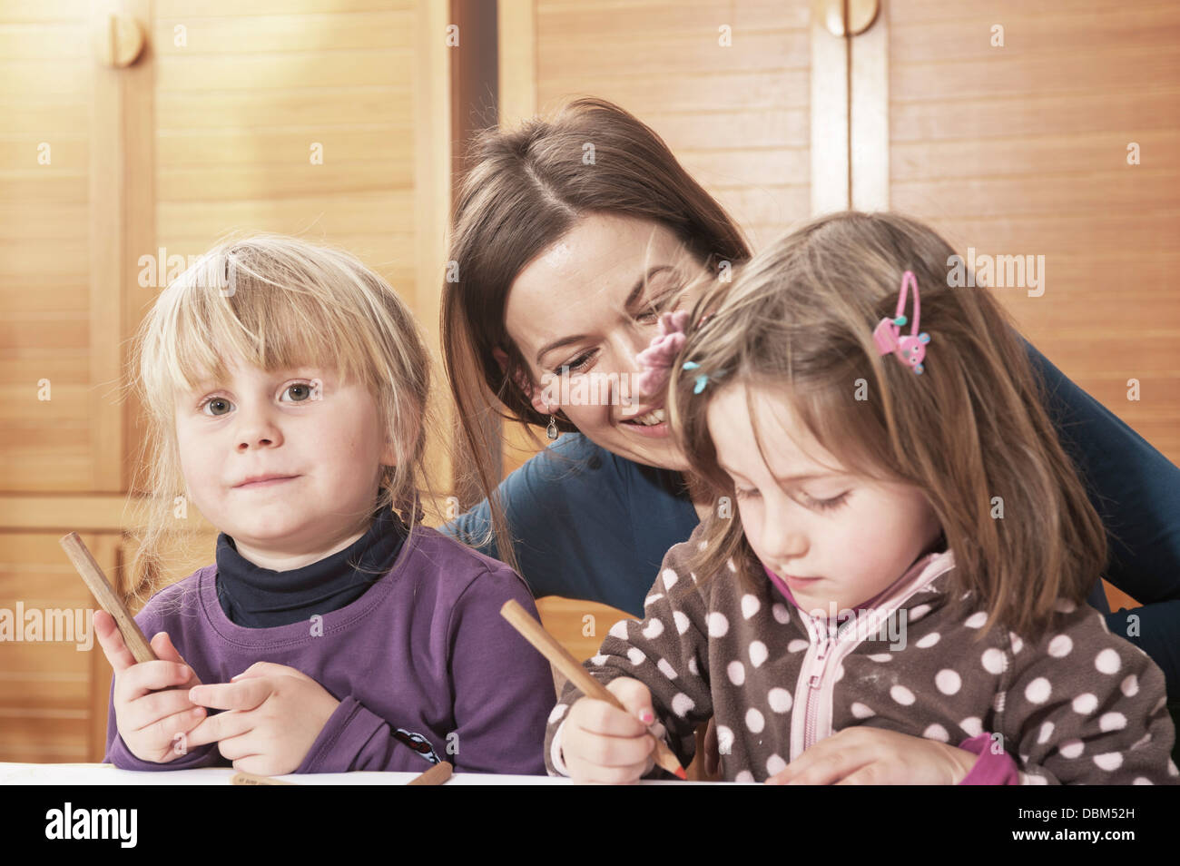 Carer child paint hi-res stock photography and images - Alamy