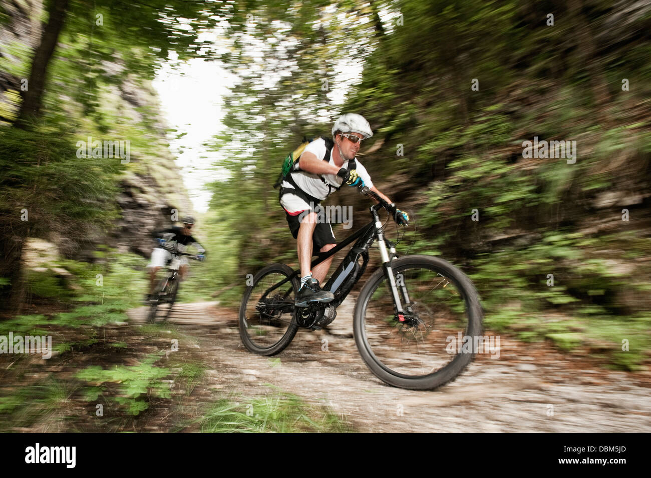 Two mountain bikers riding on a trail, Schwarzachental, Bavaria ...