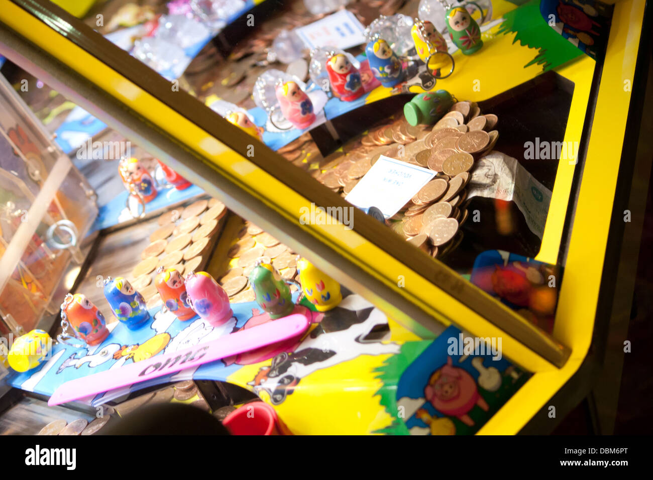 A fun fair arcades by the seafront with fruit machines and penny ...