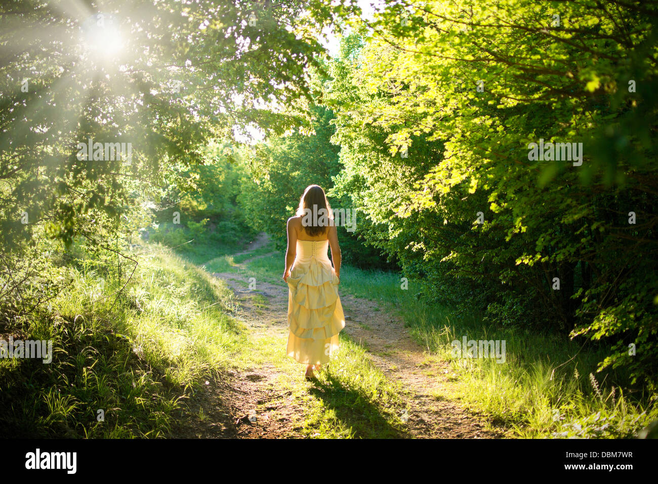 Fairy woman walking in forest hi-res stock photography and images - Alamy