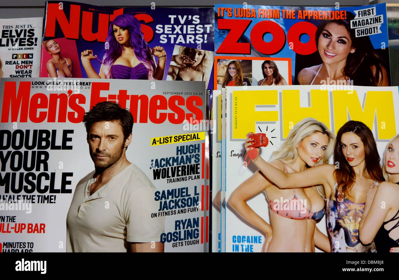 "Lads Mags" men's magazines on top shelf in supermarket, London Stock Photo - Alamy