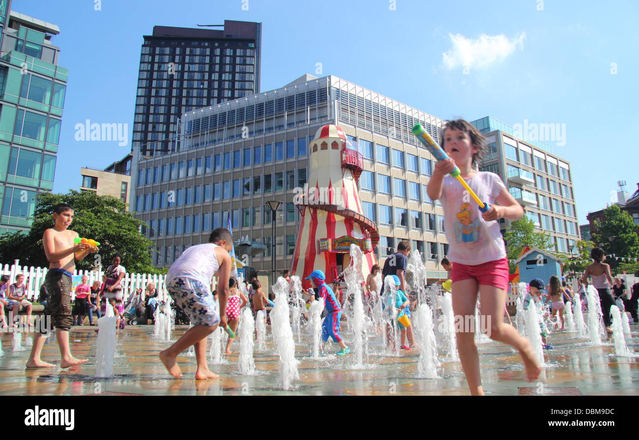 Urban seas-siders enjoy the cool waters of a fountain at ‘Sheffield By ...