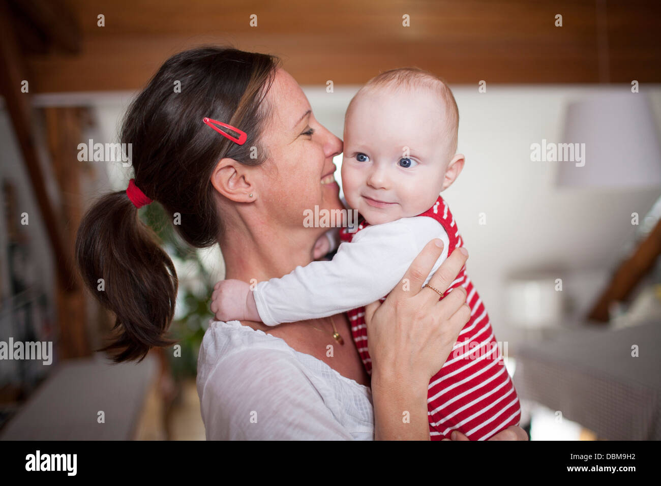 Young mother with baby girl, Munich, Bavaria, Germany Stock Photo - Alamy