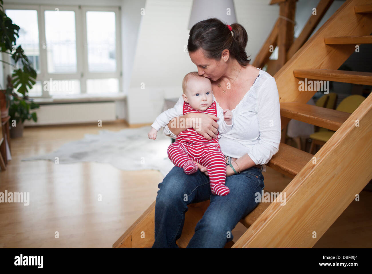 Young mother with baby girl at home, Munich, Bavaria, Germany Stock ...