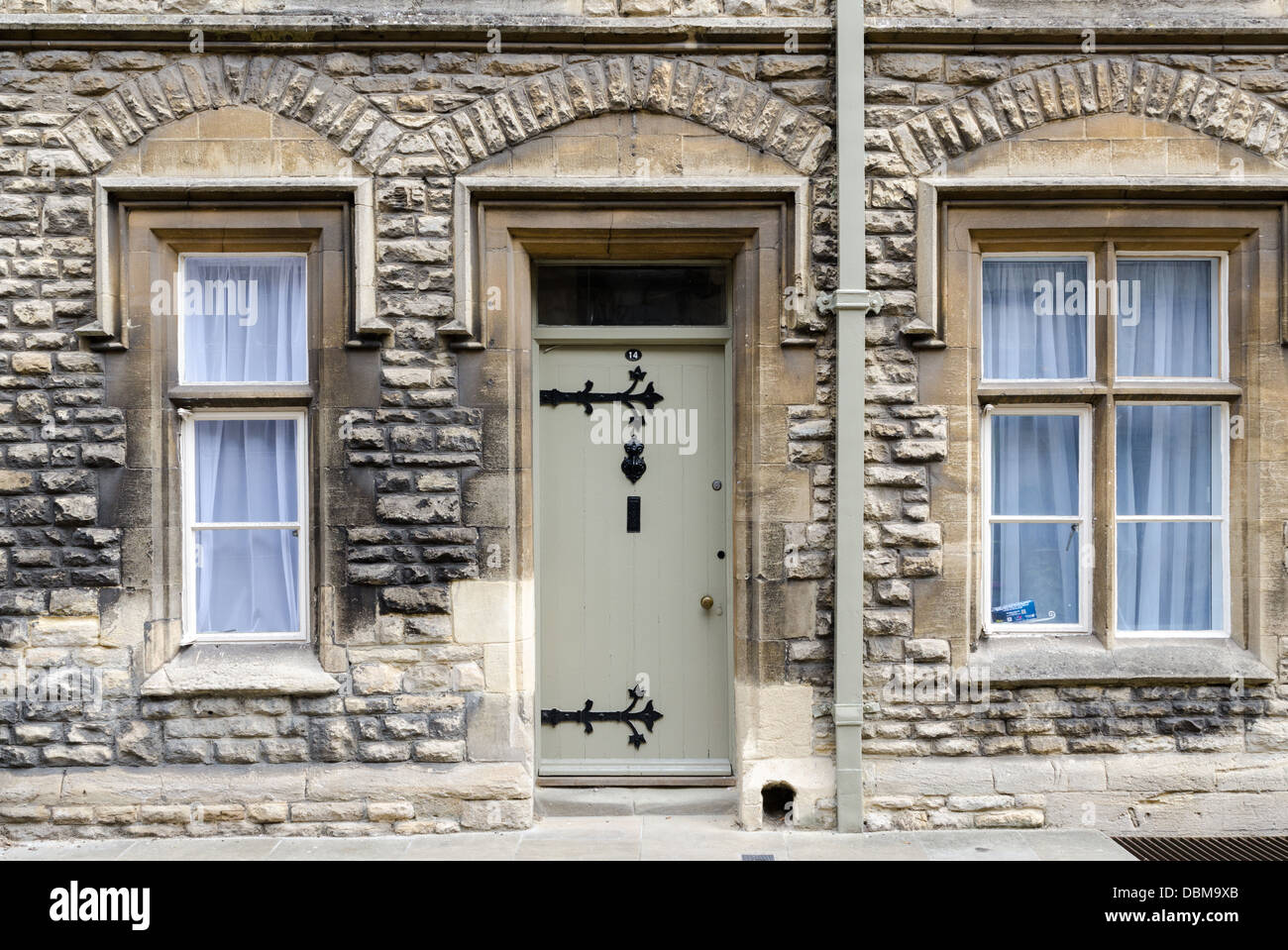 Traditional painted wooden front door in the Cotswold town of ...