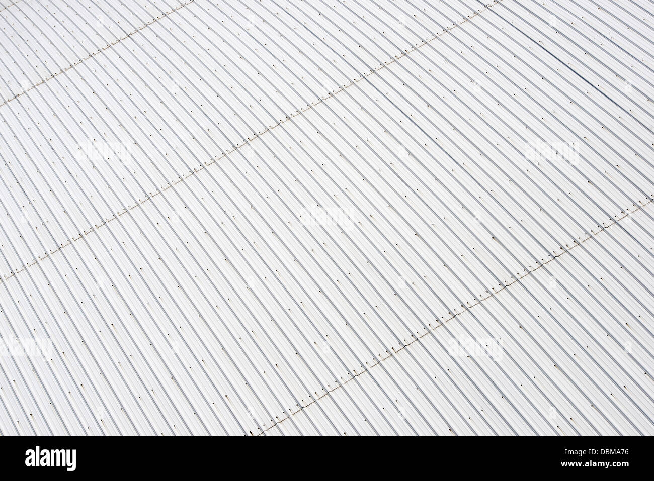 abstract background created by the surface of a metal roof industrial ...