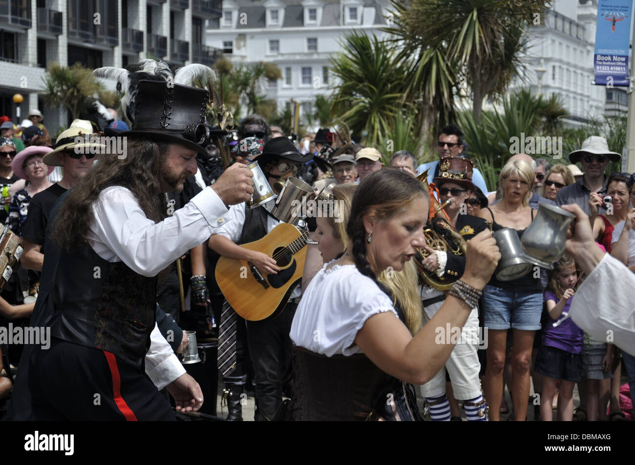 Steampunk morris dancers dancing on Eastbourne sea front at Lammas ...
